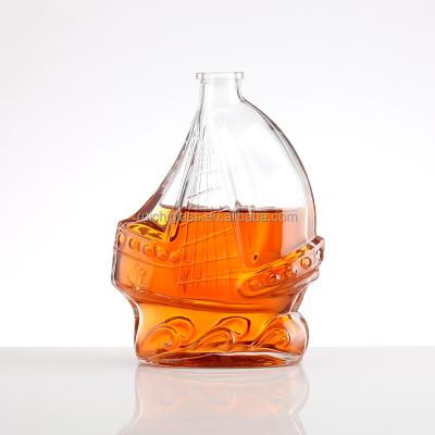 China 350ml 500ml 750ml Sailboat Shaped Glass Bottle with Cap Hot Stamped Smooth Surface for sale