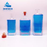 China Transparent Extra Flint Whisky Bottle 700ml 750ml 1L Standard Transparent Glass Bottle for sale