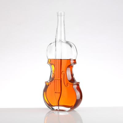 China Super Flint Glass Direct Transparent Vodka Rum Gin Bottles 700ml 750ml Unique Bottle Shape for sale