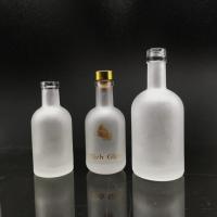 China 250ml 700ml Frosted Round Glass Bottle for Liquor Made of Super Flint Glass Material for sale