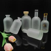 China 250ml 700ml Frosted Round Glass Bottle for Liquor Made of Super Flint Glass Material for sale