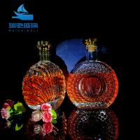 China Super Flint Glass 750ml Clear Embossed Vodka Elegant Custom Fancy Glass Liquor Bottles for sale