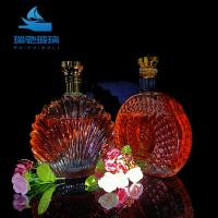China Super Flint Glass 750ml Clear Embossed Vodka Elegant Custom Fancy Glass Liquor Bottles for sale