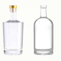 China Surface Handling Hot Stamping 700ml/750ml Glass Liquor Bottles with Screw Cap for sale
