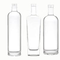 China Surface Handling Hot Stamping 700ml/750ml Glass Liquor Bottles with Screw Cap for sale