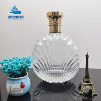 China Custom Design Bulk Empty 750ml Nordic Clear Embossed Vodka Bottle for Light Display for sale