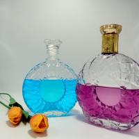 China Custom Design Bulk Empty 750ml Nordic Clear Embossed Vodka Bottle for Light Display for sale