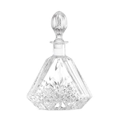 China Customized Custom Make Classic Design Exquisite Emboss Square 70cl Liquor Glass Bottle for sale