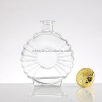 China Vodka Tequila Brandy Rum Glass Bottles with Gold Caps and Hot Stamping Surface Handling for sale