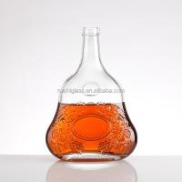 China 700ml Clear Spirit Glass Bottle Unique Design for Brandy Base Material Super Flint Glass for sale