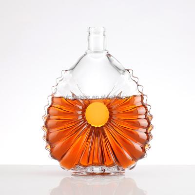 China Hot Stamping Surface Handling Empty Crystal Clear Glass Bottle for Rum Brandy for sale