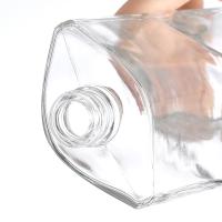 China 750ml Round Clear Frosted Vodka Specialty Wine Bottles with Stopper Beverage Industry for sale