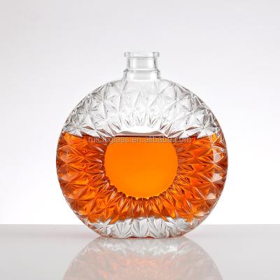 China Round Emboss Glass Bottles The Ultimate Packaging for Hot Vodka Brandy Wine for sale