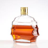 China Collar Material Aluminum Plastic PP Hot Stamping Glass Bottle for 700ml 750ml Vodka for sale