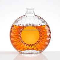 China 500ml Luxury Whisky Glass Bottles with Fashion Design and Embossed Logo for sale