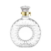 China 500ml Luxury Whisky Glass Bottles with Fashion Design and Embossed Logo for sale