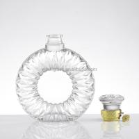 China 500ml Luxury Whisky Glass Bottles with Fashion Design and Embossed Logo for sale