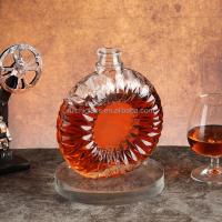 China 500ml Luxury Whisky Glass Bottles with Fashion Design and Embossed Logo for sale