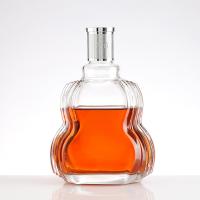 China 250ml 375ml 500ml Unique Shape Glass Tequila Bottle with Sealed Cork Lid Hot Stamping for sale