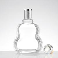 China 250ml 375ml 500ml Unique Shape Glass Tequila Bottle with Sealed Cork Lid Hot Stamping for sale