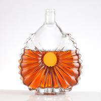 China Embossed Luxury Brandy Glass Bottles Top Selling Transparent Whiskey Bottles for sale