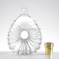 China Embossed Luxury Brandy Glass Bottles Top Selling Transparent Whiskey Bottles for sale