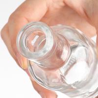 China Transparent 250ml 8oz Glass Water Bottle for Juice Milk Liquor Swing Top Included for sale