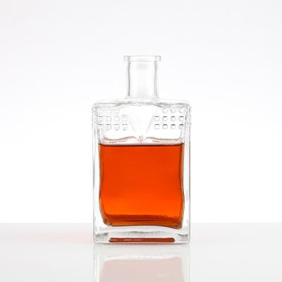 China Transparent Round Flint Glass Liquor Wine Vodka Tequila Bottle with Cork Lid Perfect for sale