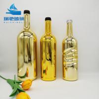 China Super Flint Glass Custom Design 700ml 750ml Metallic Gold Champagne Bottle with Cork for sale