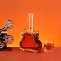 China Super Flint Glass Guitar Shaped Whisky Bottle for Liquor Wine Vodka Tequila for sale