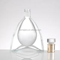 China Surface Handling Hot Stamping Clear Glass Brandy Bottle for Gin Tequila 500ml 700ml for sale