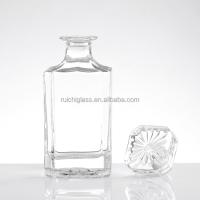 China Hot Stamping Glass Bottle for Liquor Wine Whisky Vodka Tequila Transparent Emboss Design for sale