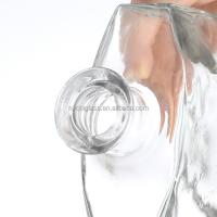 China Latest Luxury Styles Surface Handling Hot Stamping 350ml 500ml 750ml Glass Drinking Bottle for sale
