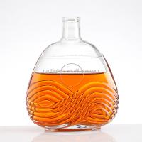 China Transparent Vodka Bottles in Super Flint Glass for Brandy at and Embossed Design for sale