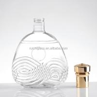 China Transparent Vodka Bottles in Super Flint Glass for Brandy at and Embossed Design for sale