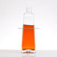 China Super Flint Glass Transparent Whiskey Bottle with Aluminum Collar and Plastic PP Material for sale