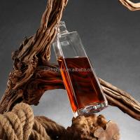 China Super Flint Glass Transparent Whiskey Bottle with Aluminum Collar and Plastic PP Material for sale