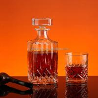 China Beverage Industrial Luxury Emboss Square Whisky Glass Bottles with Sophisticated Design for sale