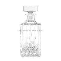 China Beverage Industrial Luxury Emboss Square Whisky Glass Bottles with Sophisticated Design for sale