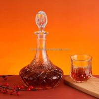 China Hot Stamping Top Grade Embossed Whisky Glass Bottle for Luxury Spirits Packaging for sale