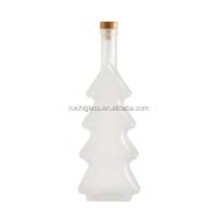 China Fancy Custom Design Unique Shape 350ml 500ml 700ml Glass Liquor Bottle for Champagne for sale