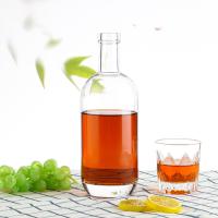 China 750ml Clear Frosted Glass Whiskey Bottle with Screw Cap for sale