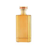 China 500ml Round Electroplate Gold Color Vodka Gin Bottles with Personalized Packaging for sale