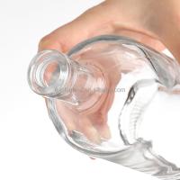 China Super Flint Glass Unique Shapes 375ml 700ml Vodka Whiskey Glass Bottles with Cap for sale