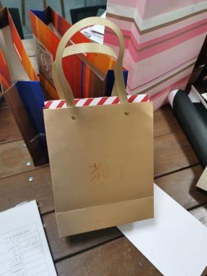China Custom Luxury Gift Garment Paper Shopping Bags With Logo Print for sale