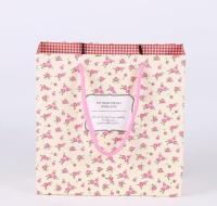 China Custom Luxury Gift Garment Paper Shopping Bags With Logo Print for sale
