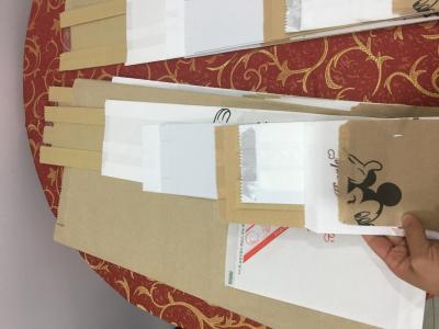 China Luxury Printed Handle Wax Paper Bag Jewelry Packaging Greaseproof for sale