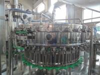China Carbonated Drink Automatic Glass Bottle Filling Machine 8000BPH with Crown Cap for sale