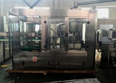 China CE Electric Automatic Water Bottle Filling Machine with 2000 - 30000b/h Capacity for sale