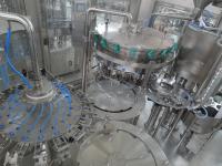 China Stainless Steel Plastic Bottle Carbonated Drink Filling Machine 1500 - 30000 BPH for sale